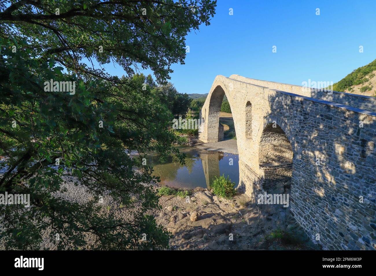 Old stone bridge of Aziz Aga, Venetikos river, Grevena, Macedonia ...