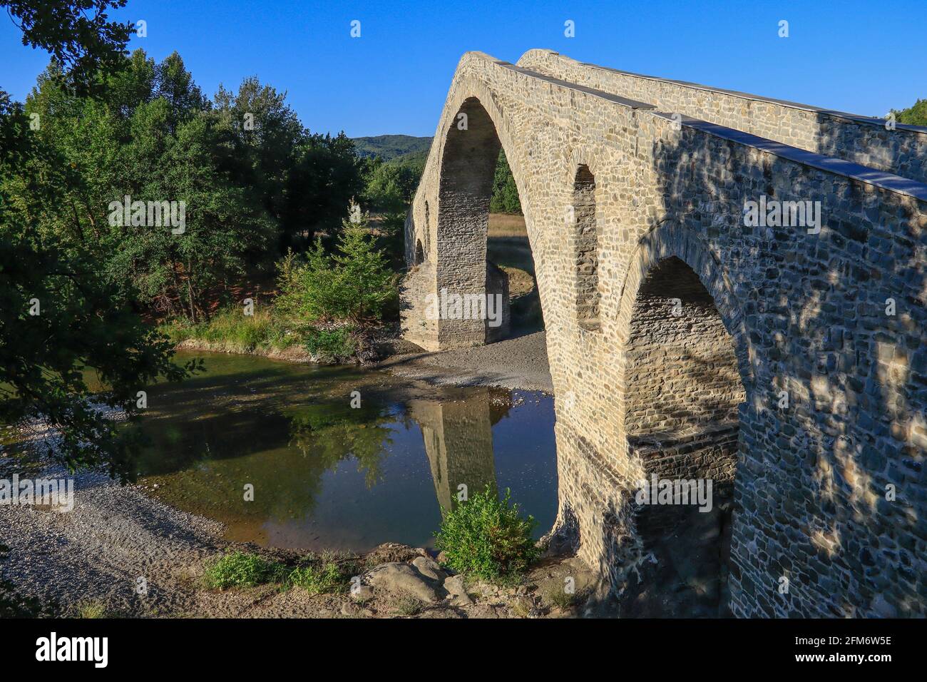 Old stone bridge of Aziz Aga, Venetikos river, Grevena, Macedonia ...