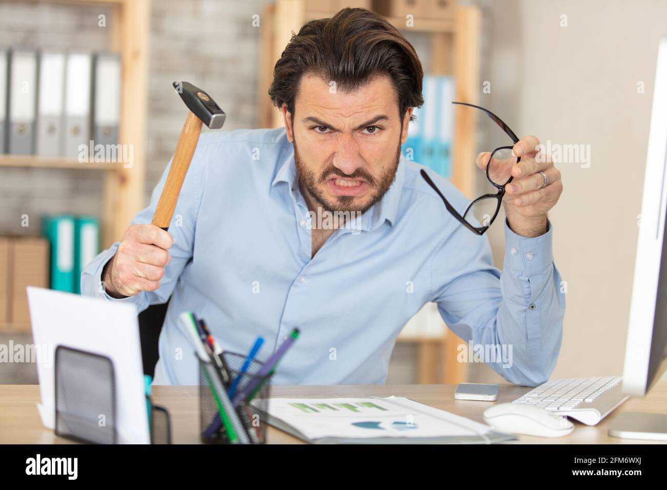 busy frustrated businessman angry in the office Stock Photo - Alamy