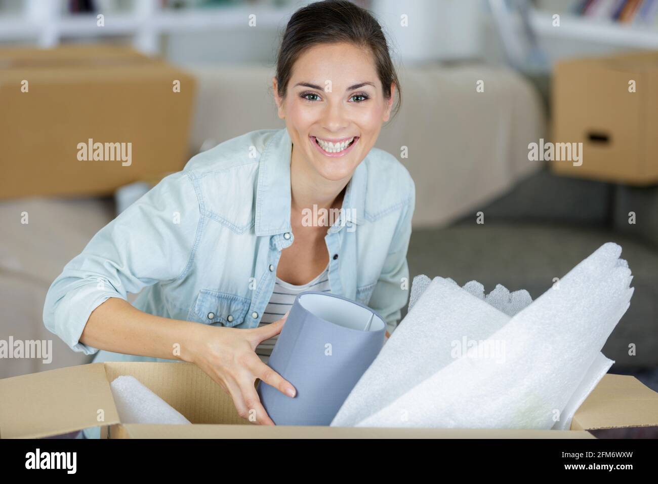 Unpacking lamp hi-res stock photography and images - Alamy