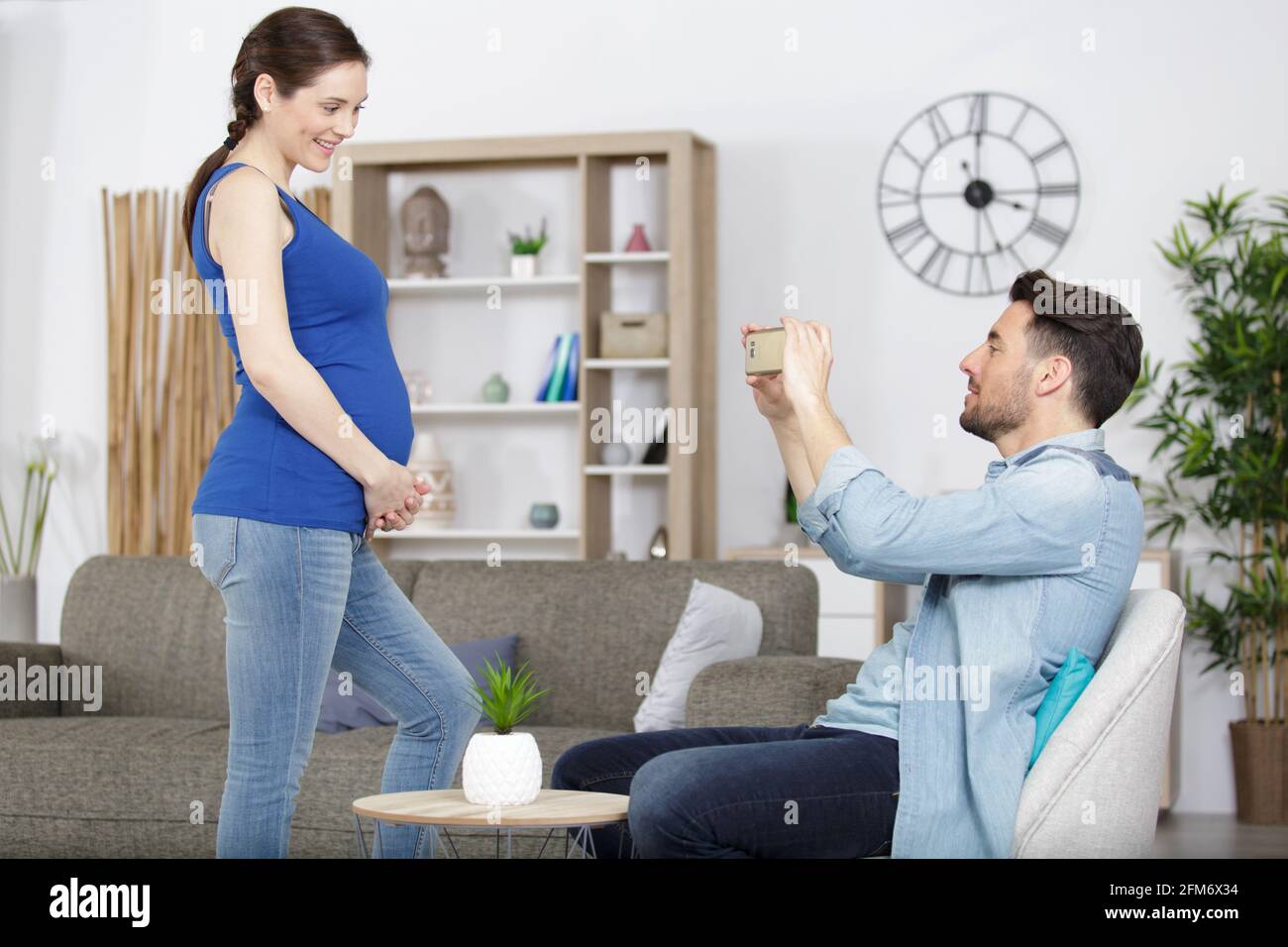 young parents expecting their first baby Stock Photo - Alamy