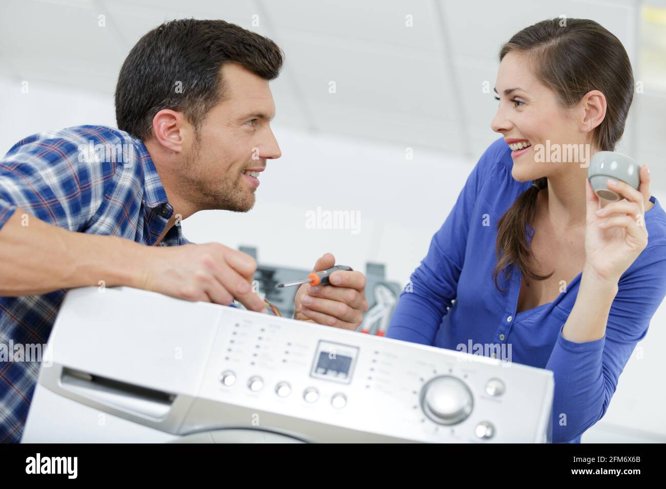 Leaking washing machine hi-res stock photography and images - Alamy