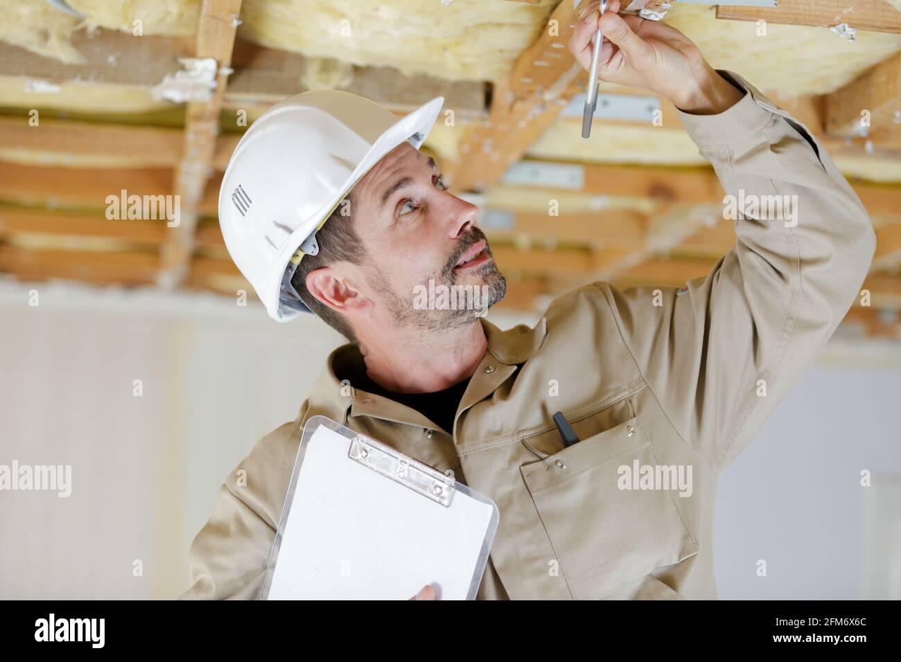 technician man hand checking the ceiling Stock Photo - Alamy
