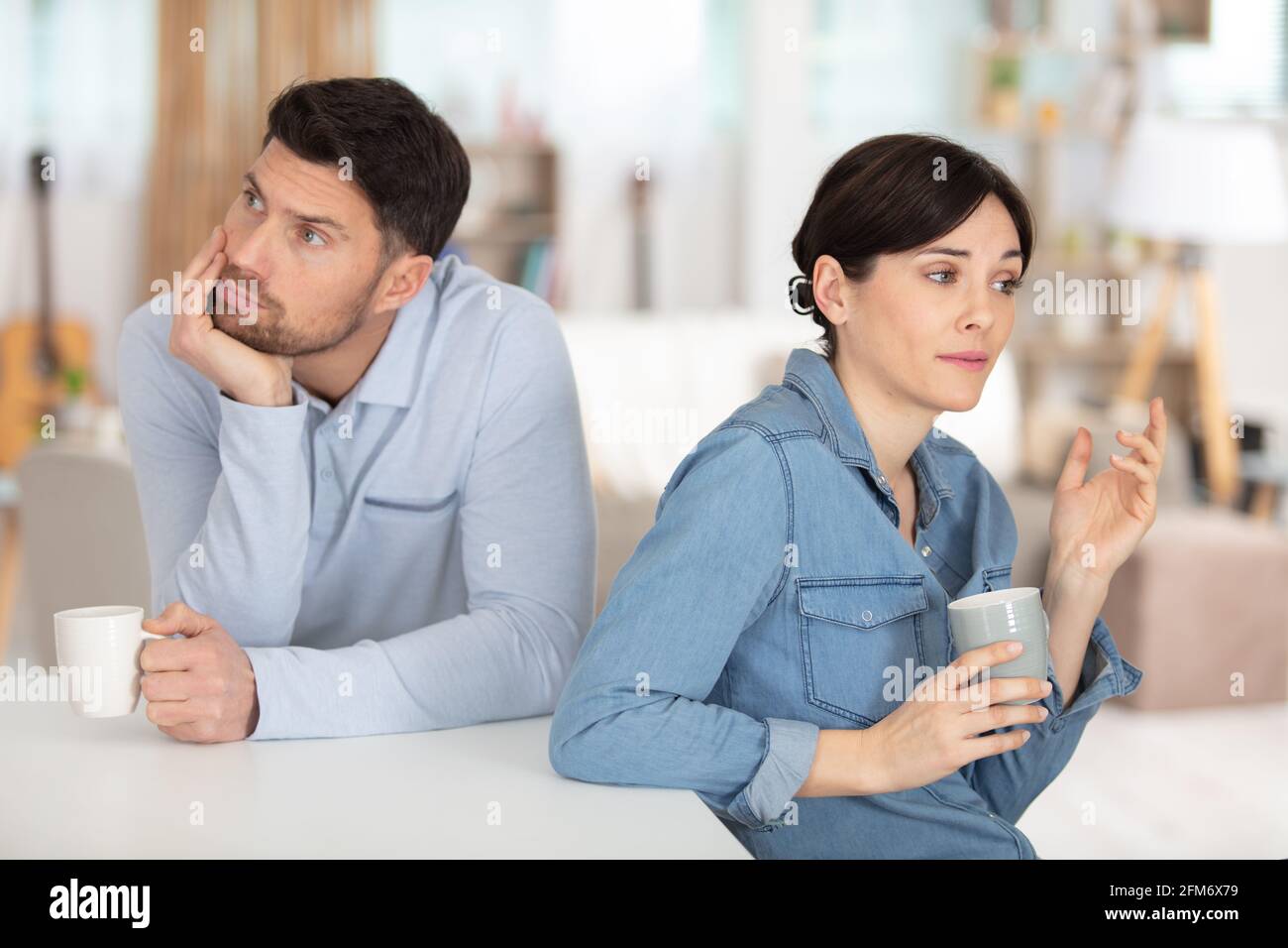 emotional couple ignoring eachother after an argument Stock Photo - Alamy