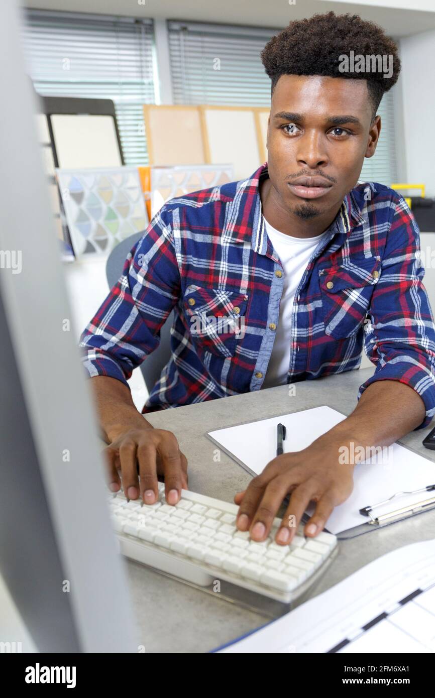 office worker counting company earnings with a calculator Stock Photo ...