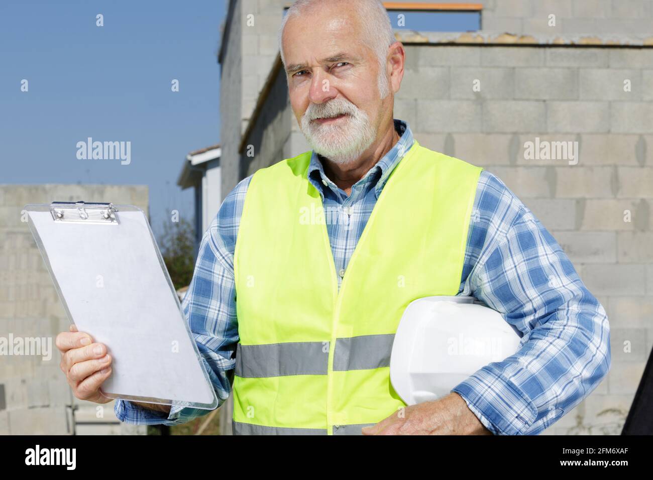 Senior engineering wearing safety vest hi-res stock photography and ...