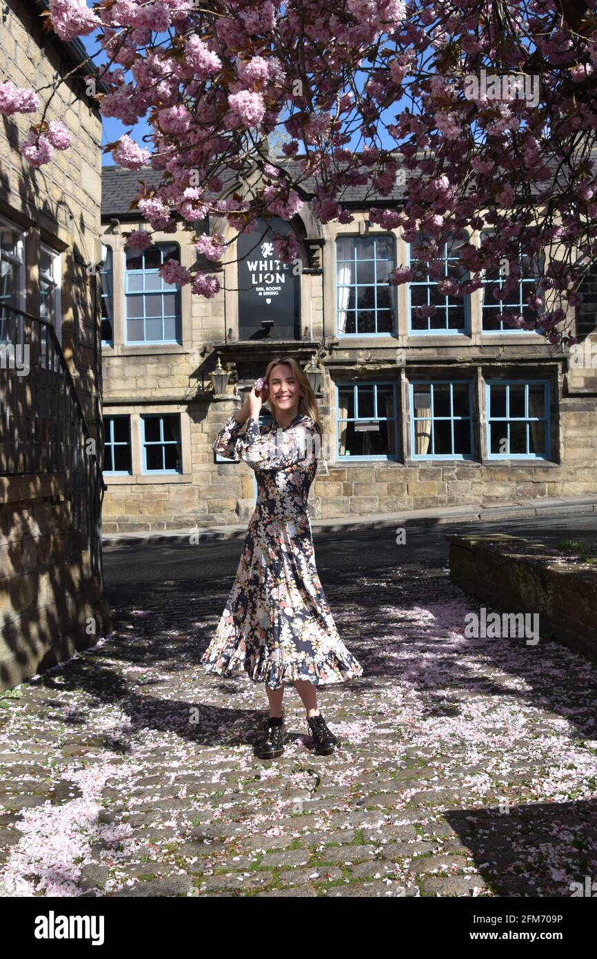 Springtime Fun & Frolics in cherry blossom outside the White Lion Hotel ...