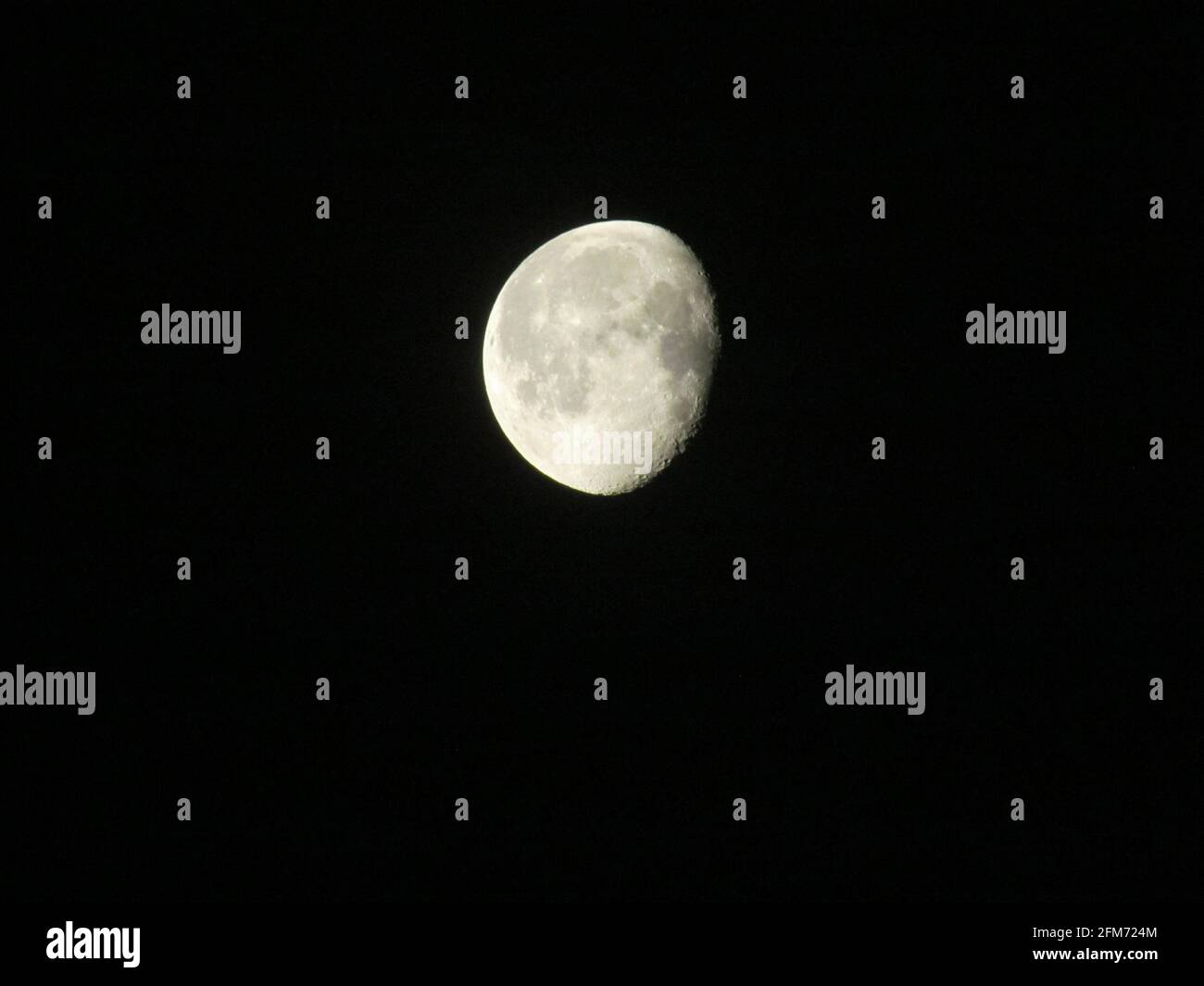 Closeup shot of the moon waning gibbous in night sky Stock Photo - Alamy