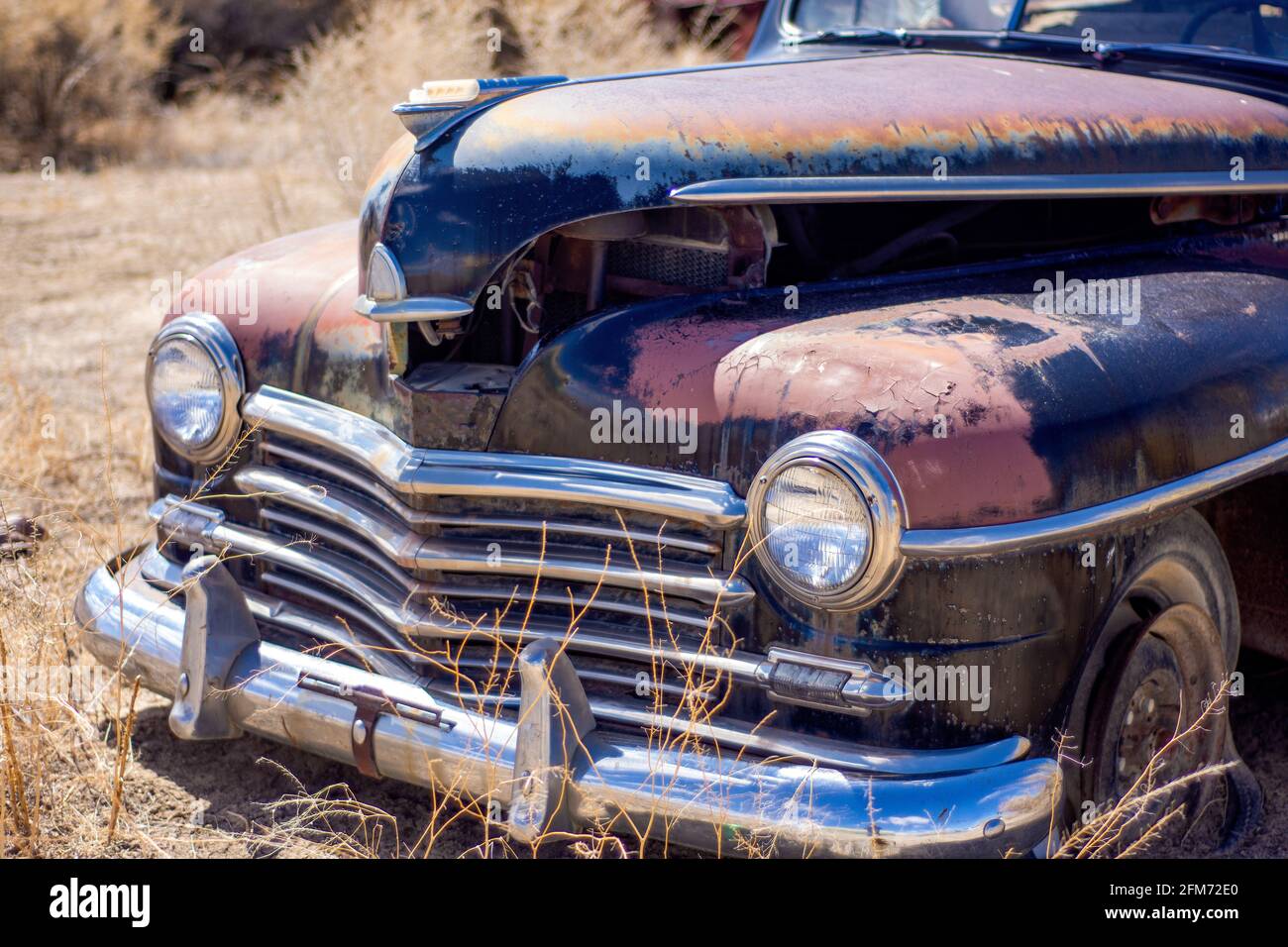 Front of the old retro car in the junkyard Stock Photo - Alamy