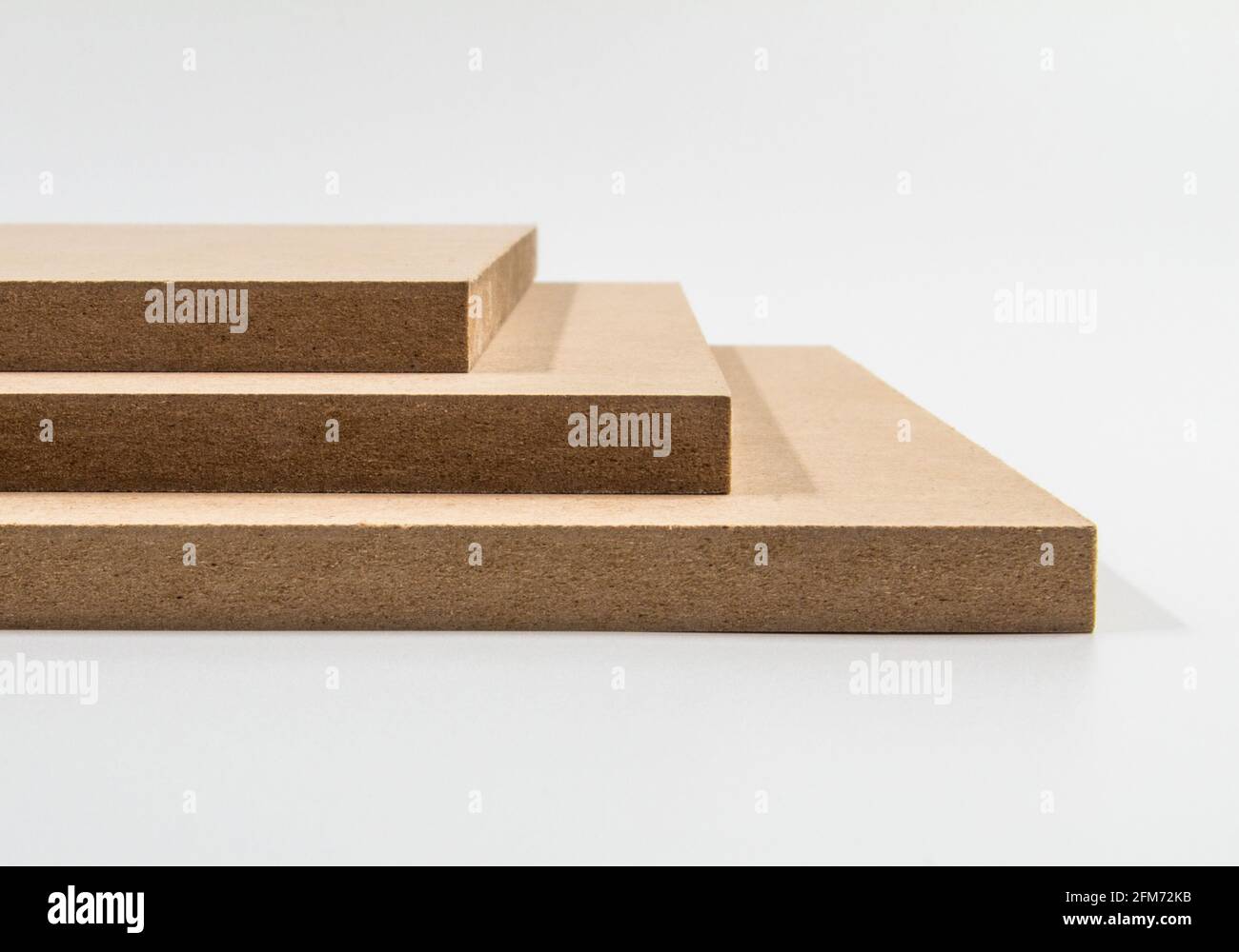 Raw MDF boards on white backgrounds Stock Photo - Alamy