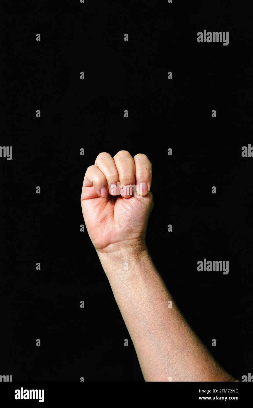 Hand making and showing Letter M International sign language dark ...