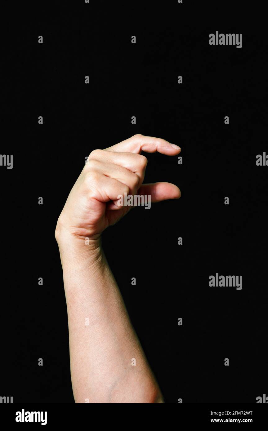 Hand making and showing Letter G International sign language dark ...