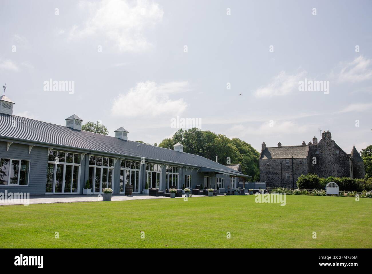 A view of the abrn at barra castle wedding venue from the lawn ...