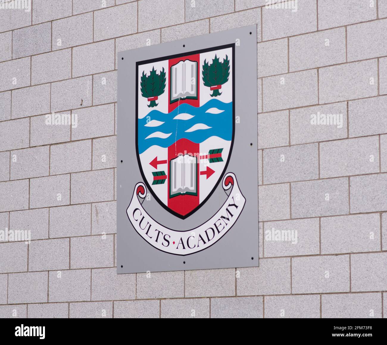 Close up of a couples bodies without faces embracing and holding hands ...