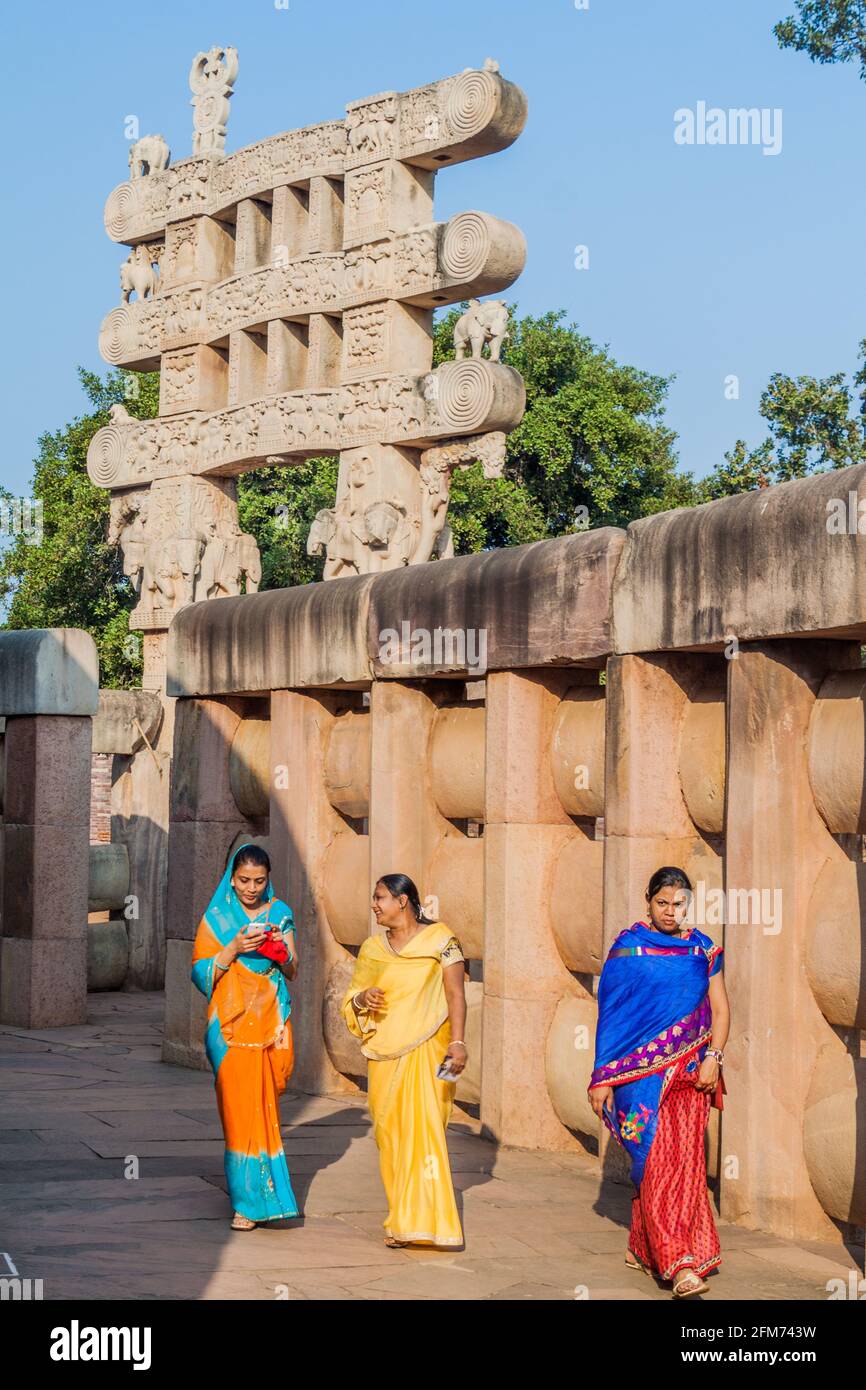 SANCHI, INDIA - FEBRUARY 4, 2017: Local women visit Stupa 1, ancient ...