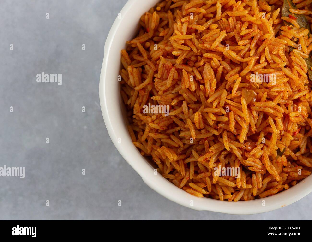 Jollof Rice in a bowl Stock Photo - Alamy