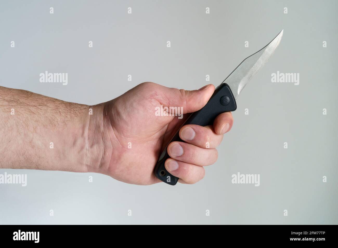 Man holding dagger hi-res stock photography and images - Alamy