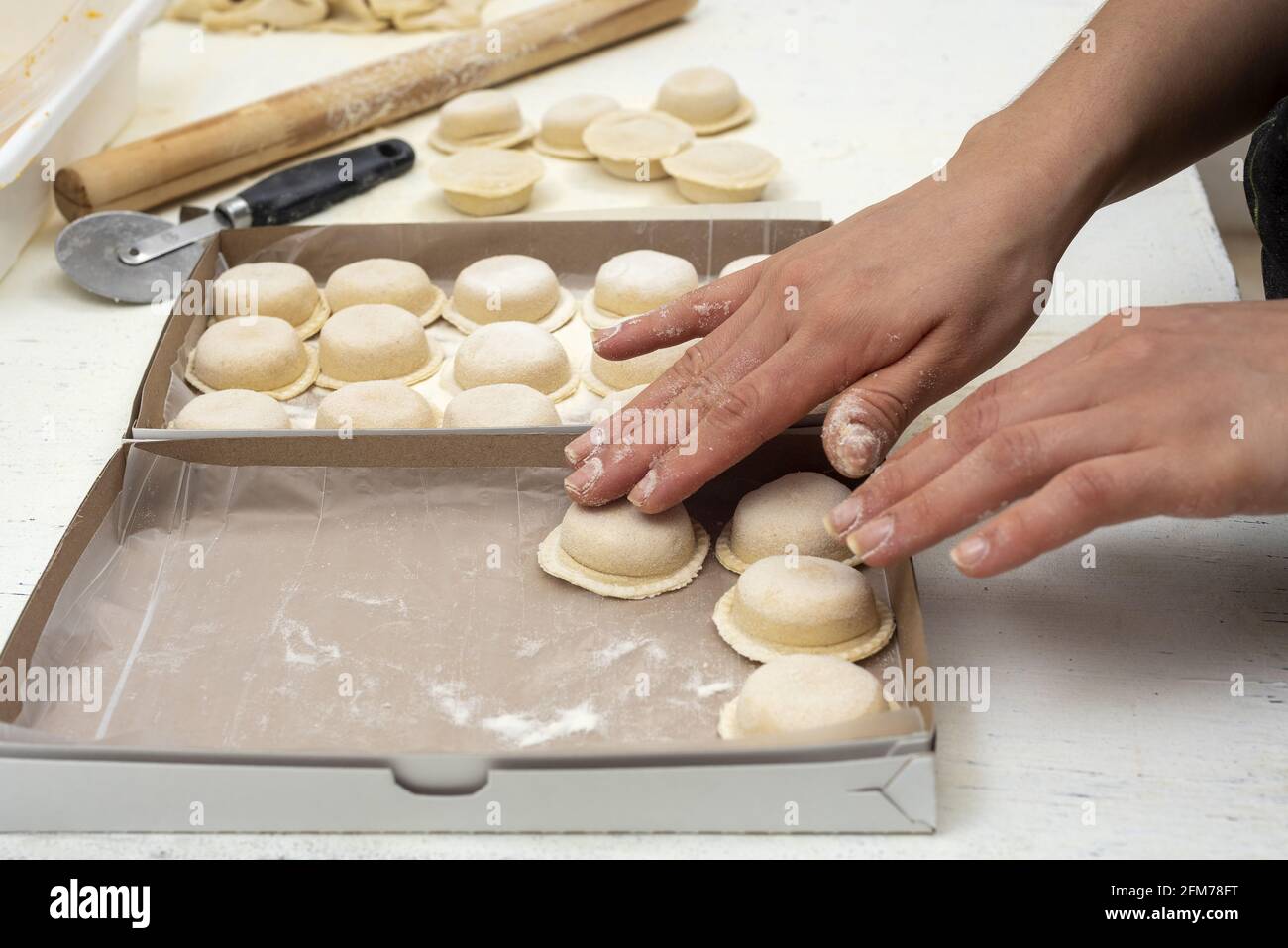 Process of preparation of dumplings Stock Photo - Alamy