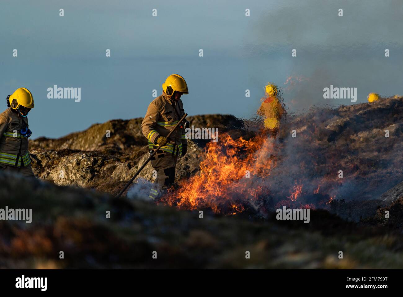 Fire Crews Tackle Gorse fire on Isle of Anglesey Stock Photo - Alamy