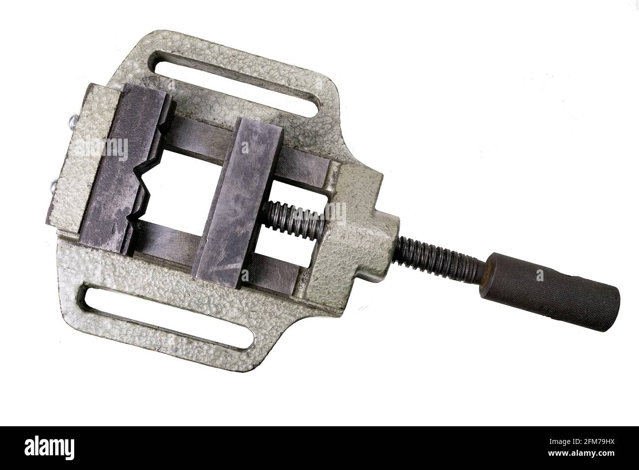 A vice for fixing workpieces in a bench drill. Robust metal mechanical ...