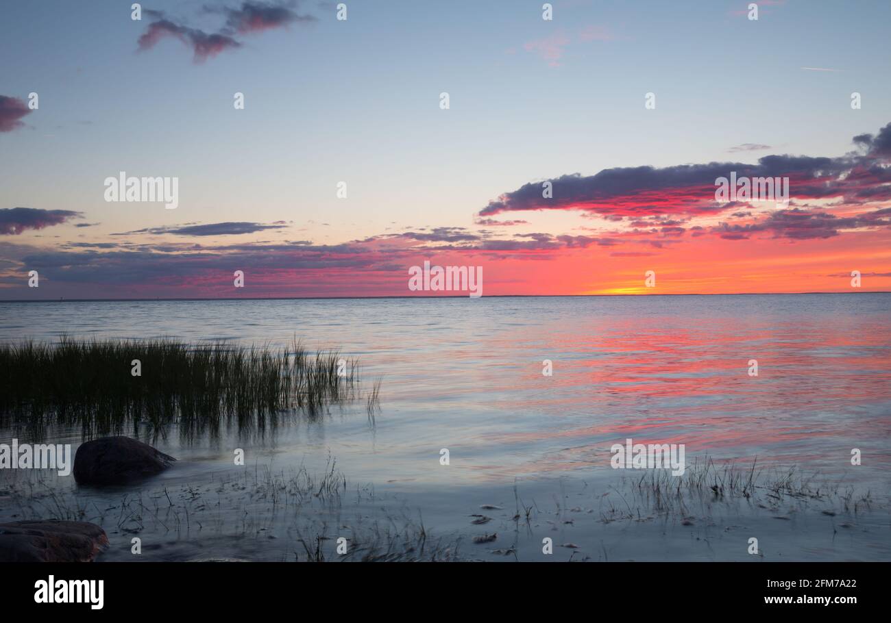 Sunsetting over sea hi-res stock photography and images - Alamy