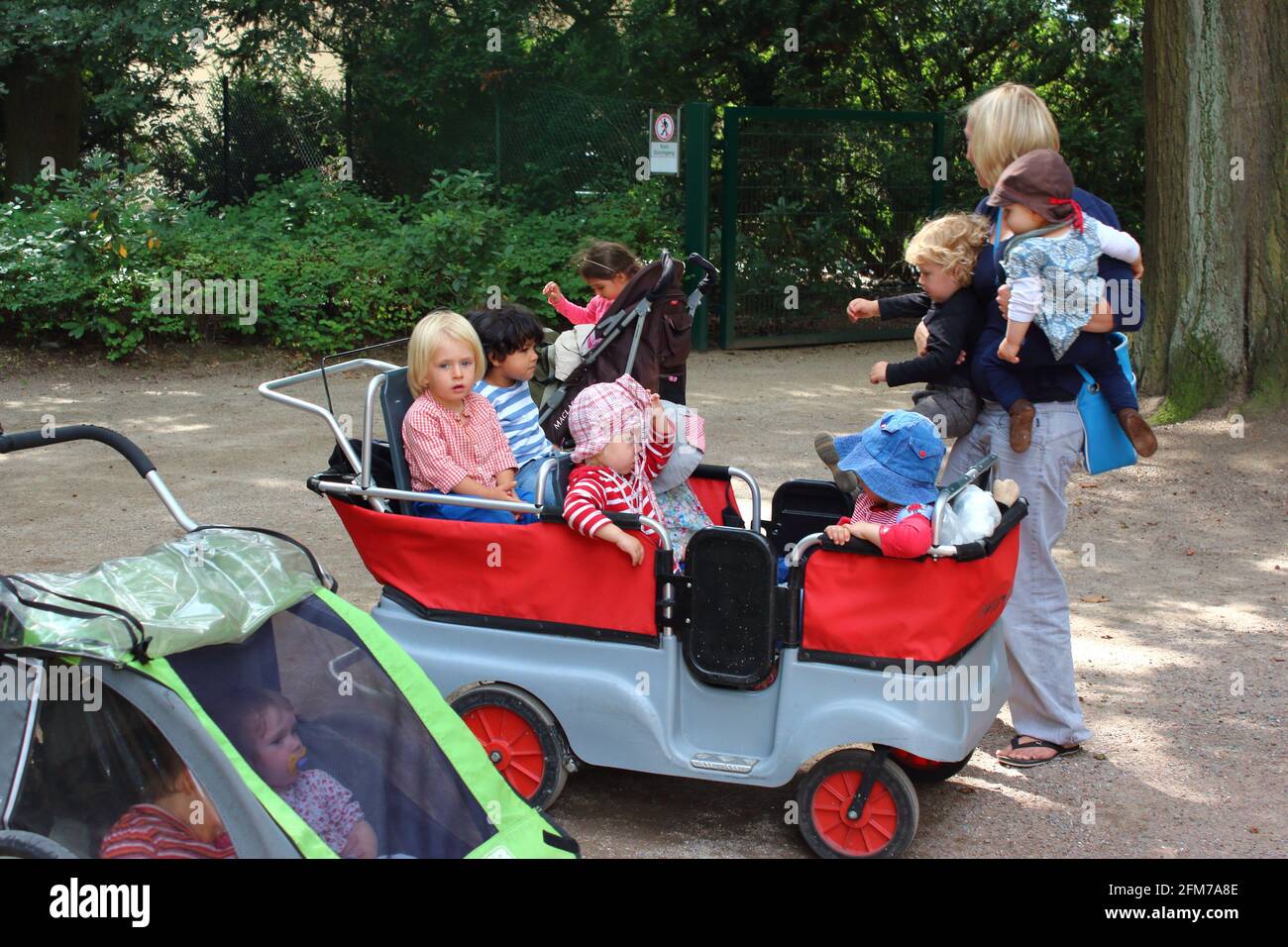 little kids, chi,ldren in pushchairs taking tour at Stock Photo - Alamy
