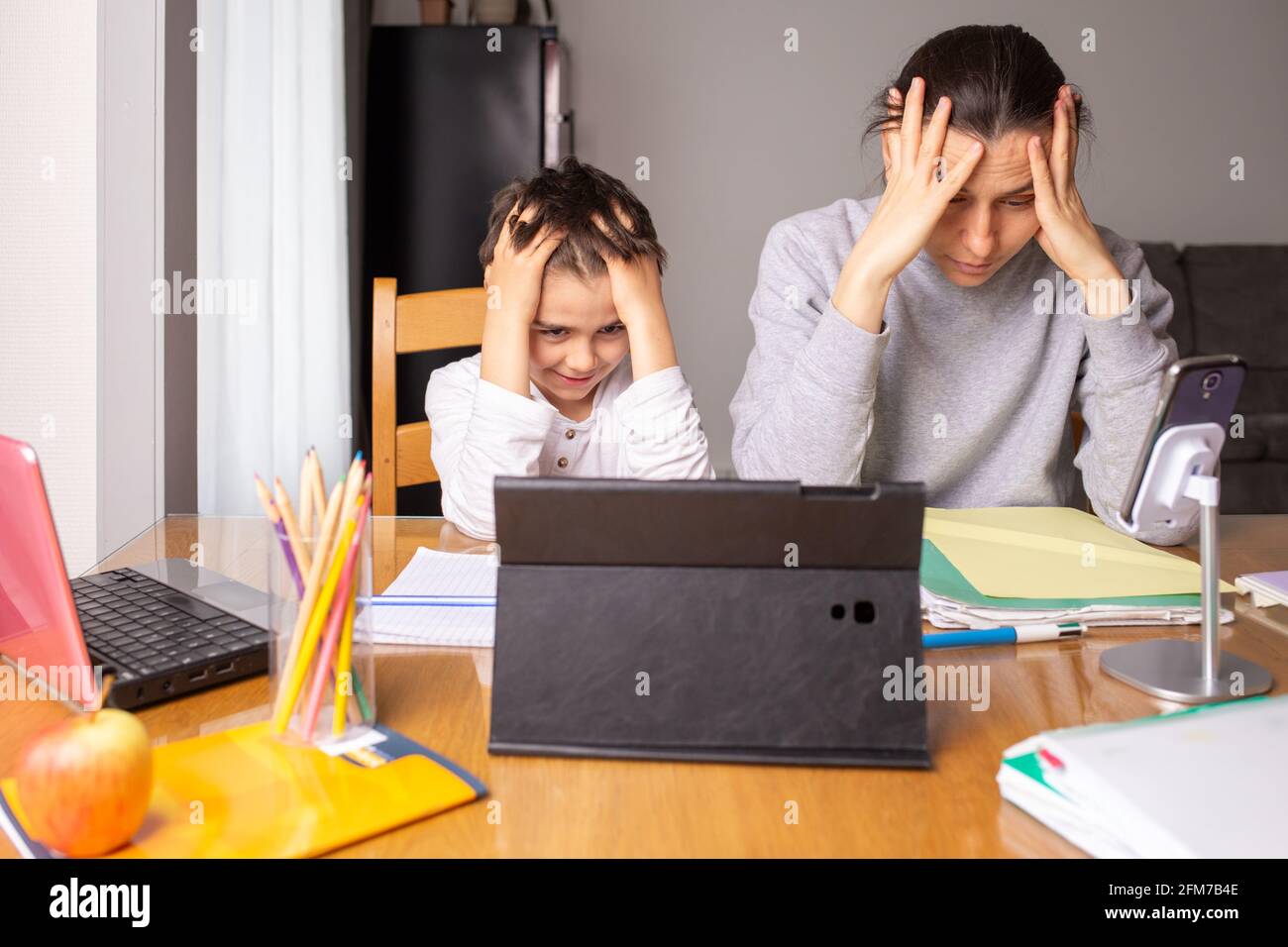 boy doing his homework while lock down, studying remotely Stock Photo ...