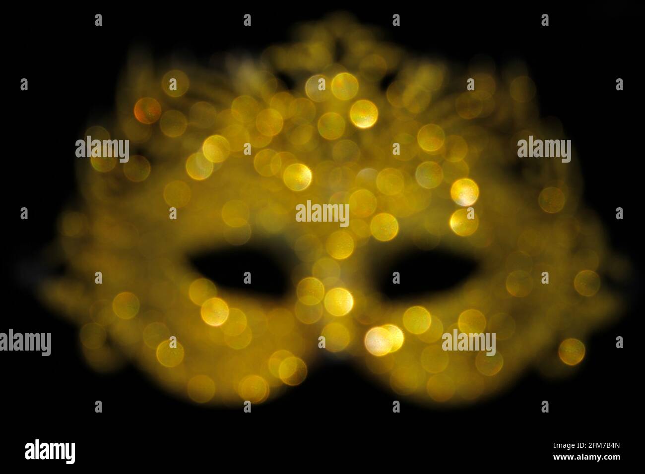 Defocused Gold Glitter Carnival Mask Bokeh Stock Photo - Alamy