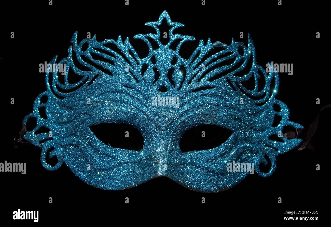 Blue Glitter Carnival Mask on Black Stock Photo - Alamy