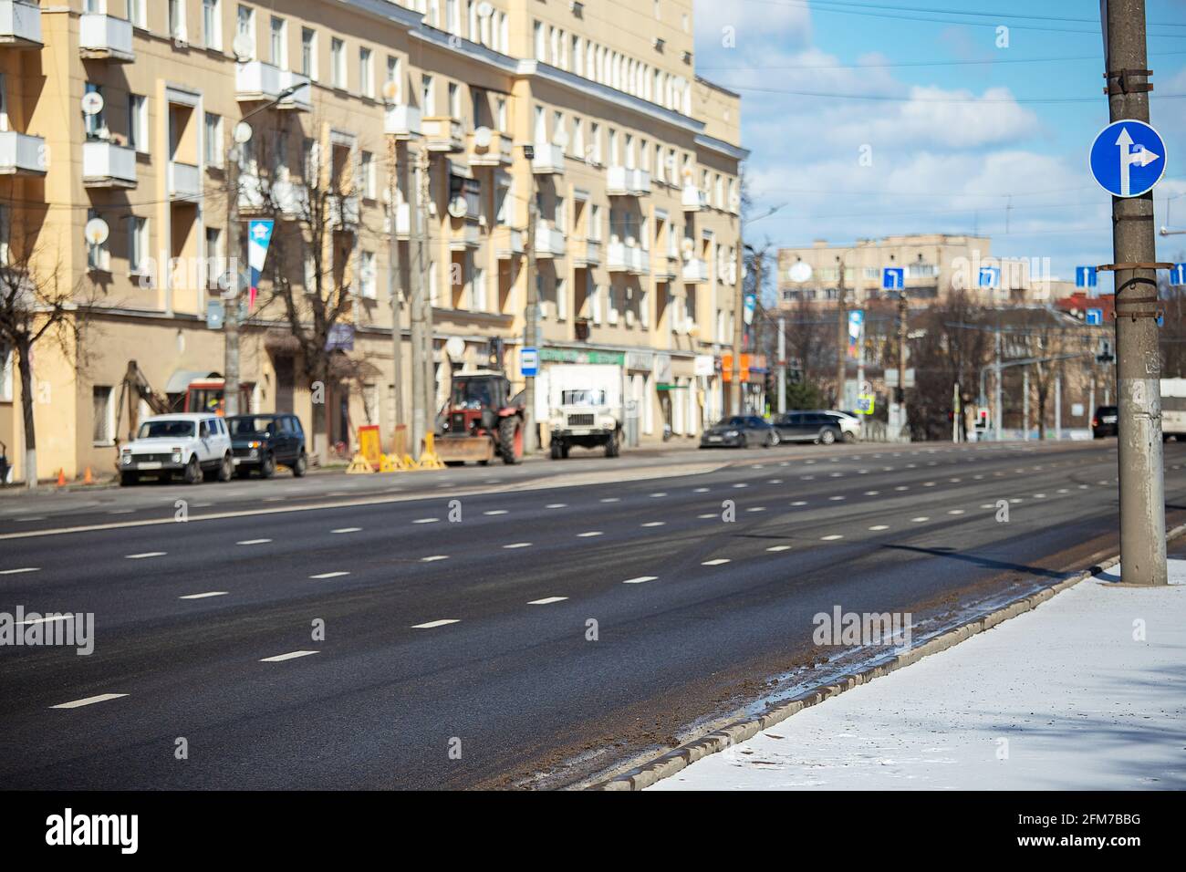 an empty street during quarantine, the roadway of a multi-lane road ...