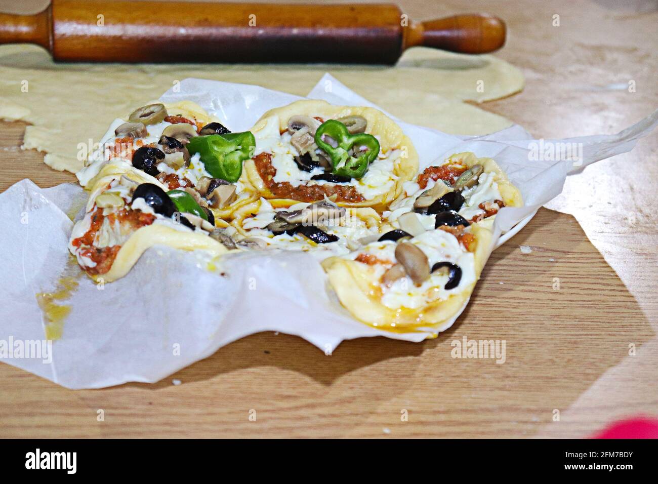Pizza before oven hi-res stock photography and images - Alamy