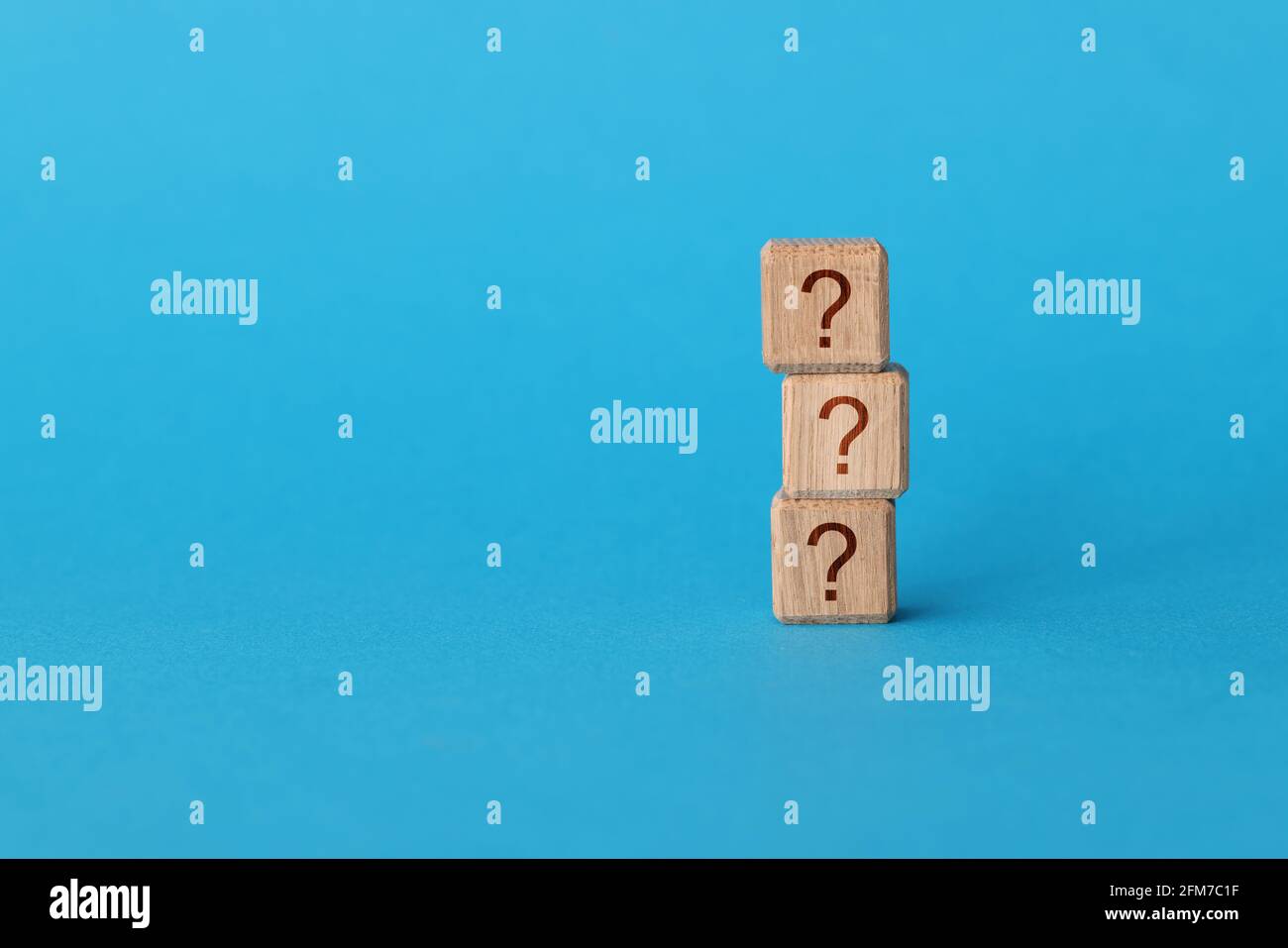 On blue background, there is pyramid of cubes with question mark Stock ...
