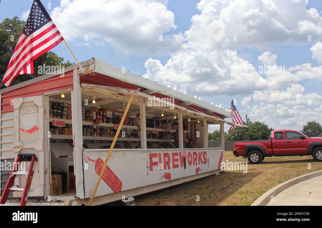 Fireworks Stand and American Flags with Blue Sky and Clouds, Red Truck ...