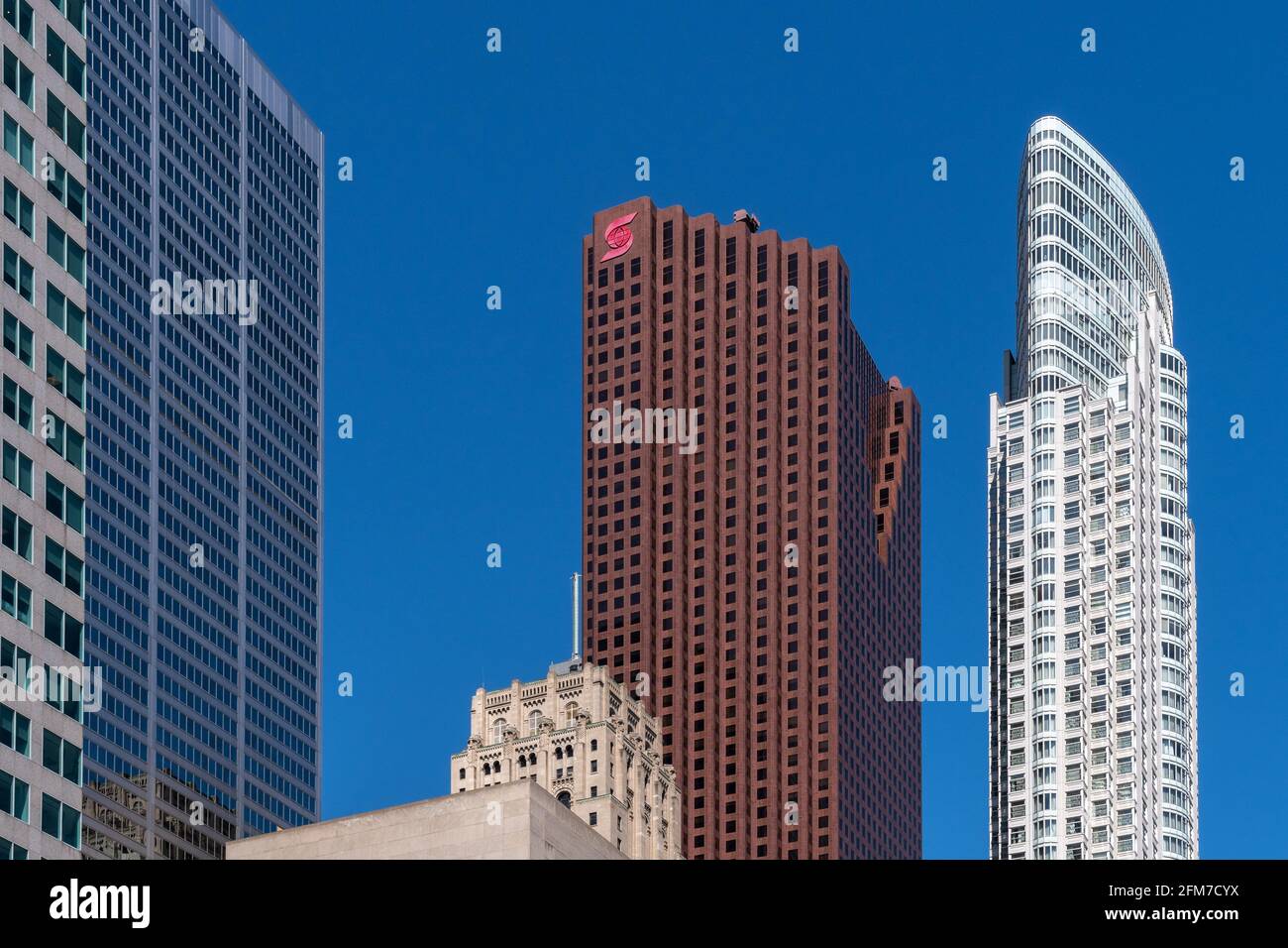 Modern skyscrapers of the Toronto financial district. The red tower in ...