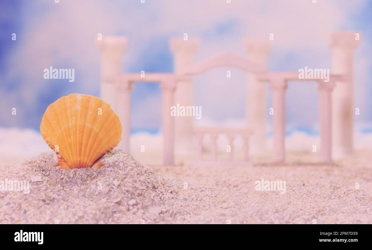 Seashell on Tropical Beach With Roman Style Ruins Stock Photo - Alamy