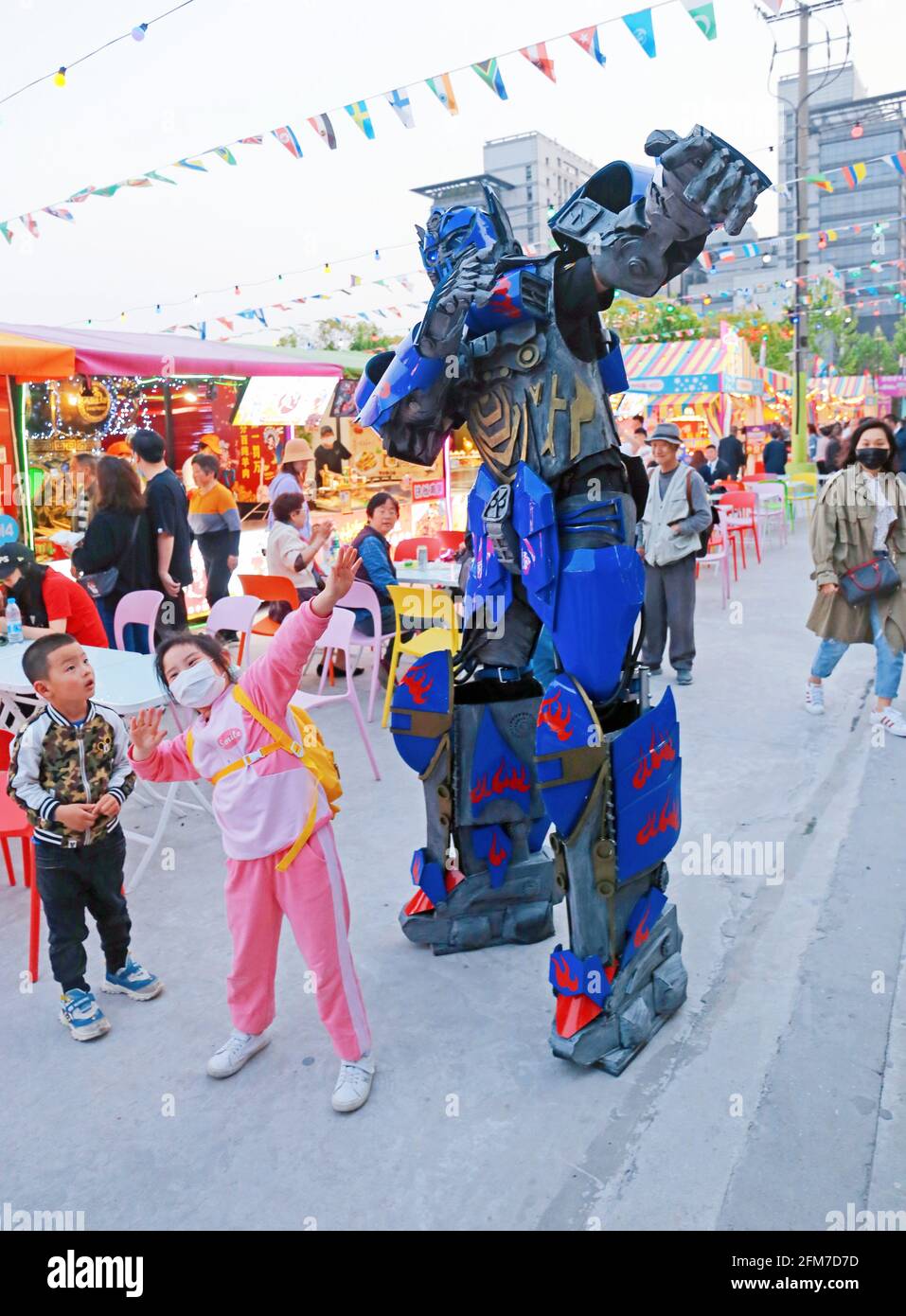 SHANGHAI, CHINA - MAY 5, 2021 - Workers dressed in COSPLAY machines as ...