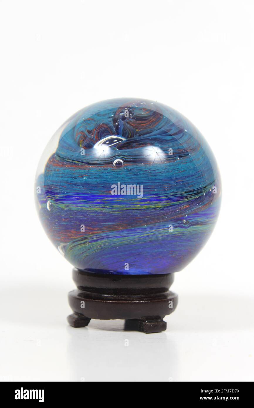 Glass Ball With Colorful swirls on White Background Stock Photo - Alamy