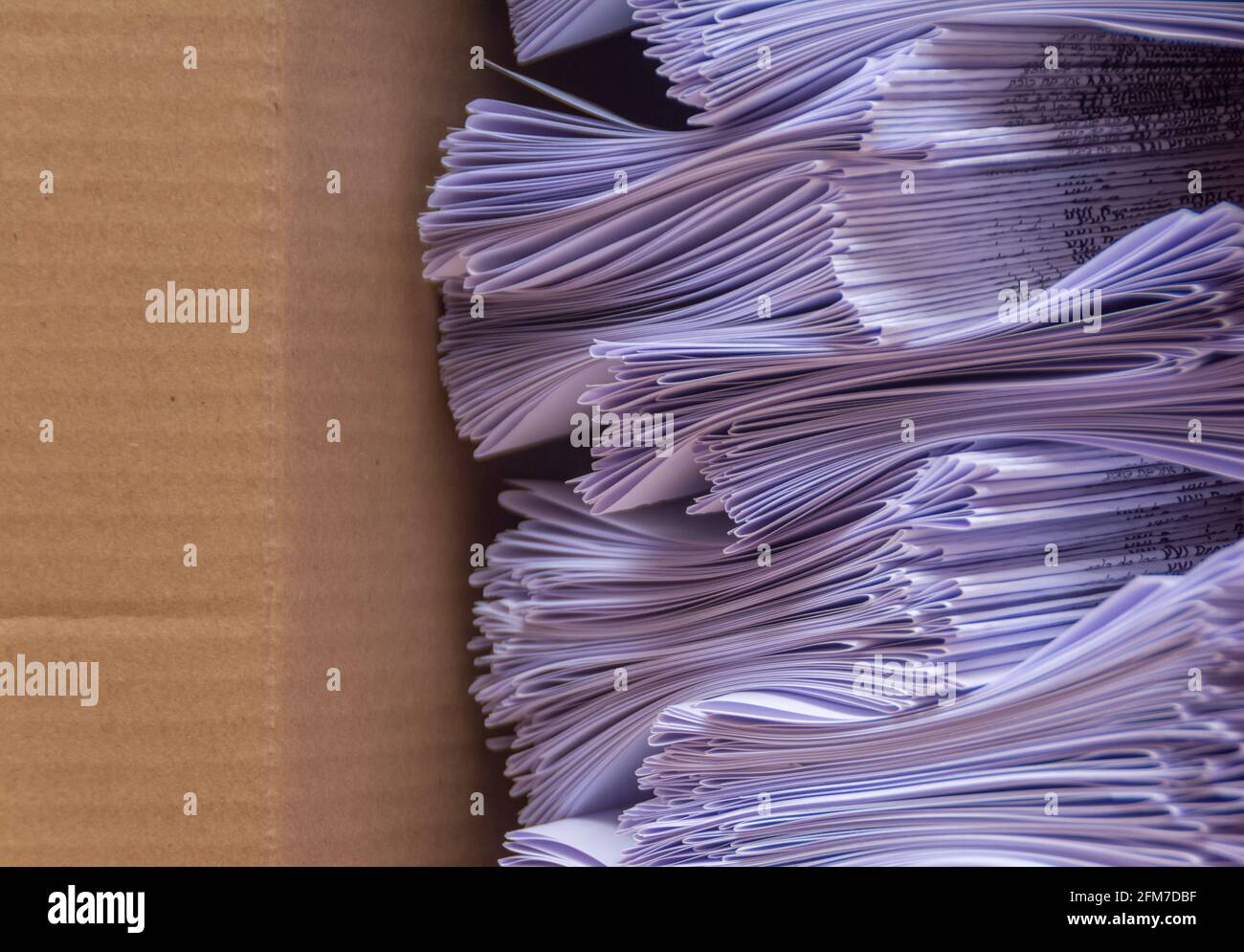 Box filled with paper sheets Stock Photo - Alamy