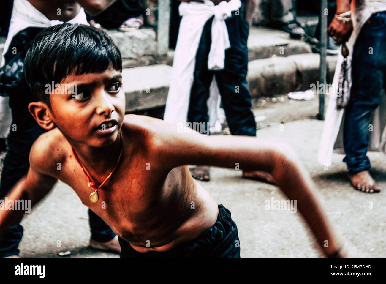 Shiite Muslims people using chains and blades during a ritual self ...