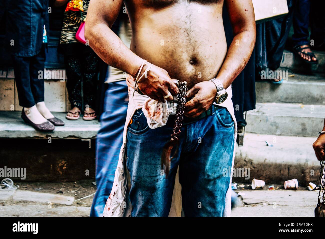Shiite Muslims people using chains and blades during a ritual self ...