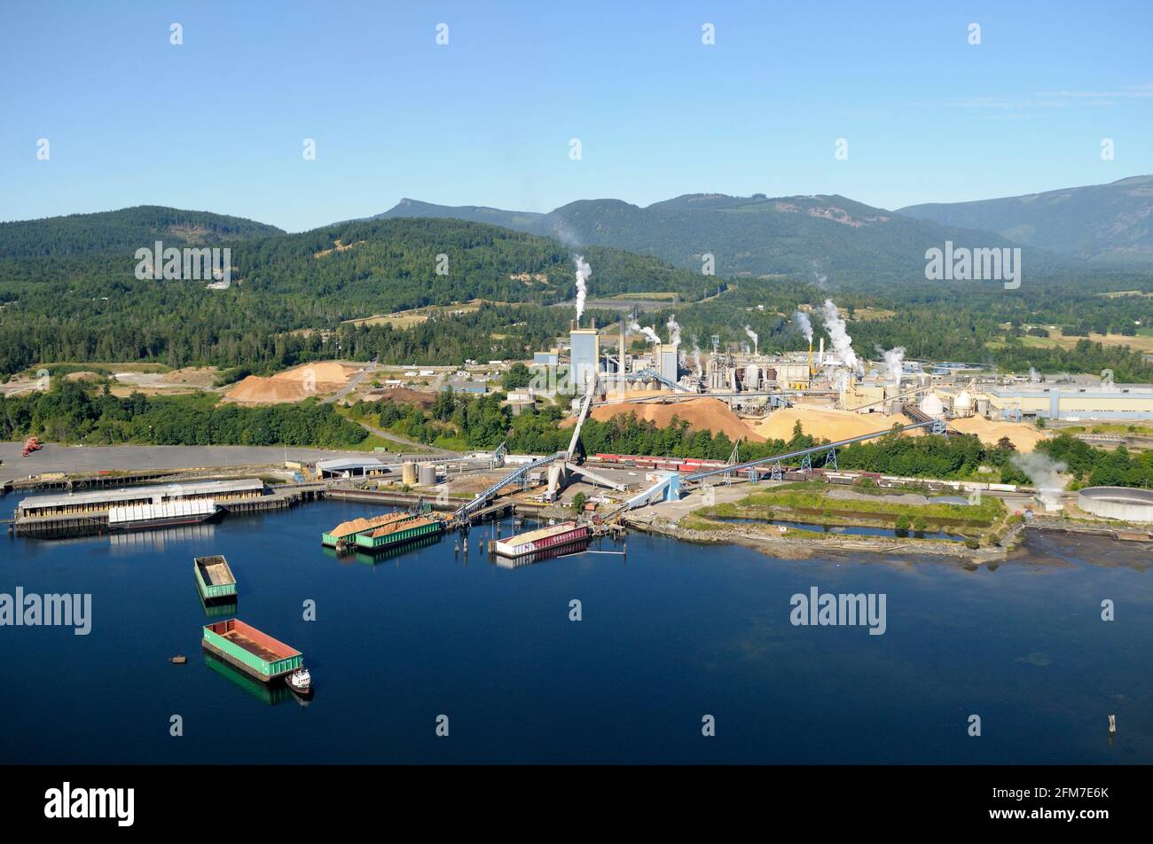 Catalyst Paper Mill and chip barges, Crofton, British Columbia aerial ...