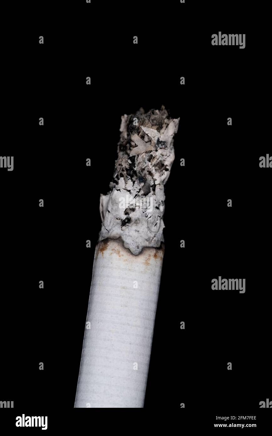 Lighted cigarette hi-res stock photography and images - Alamy