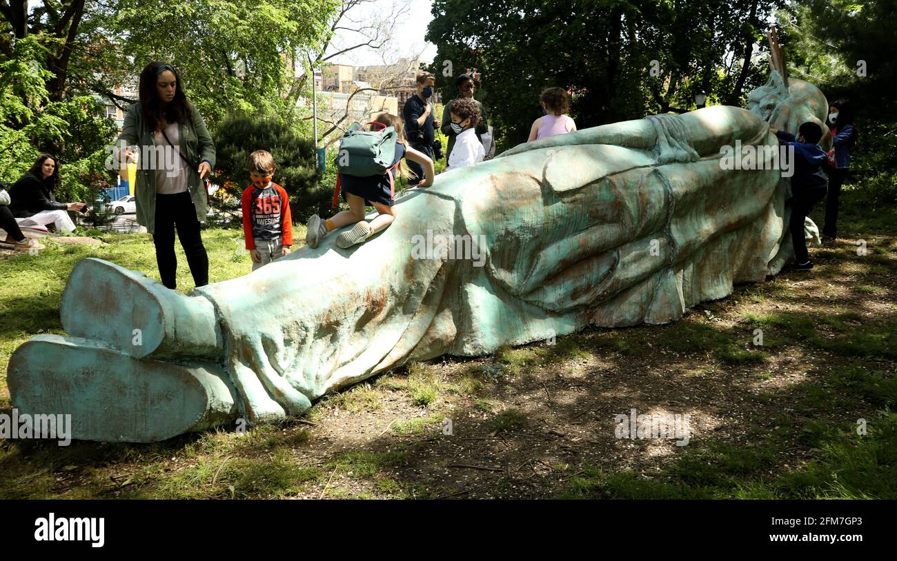 New York, New York, USA. 6th May, 2021. A view of 'Reclining Liberty' a 25 foot long sculpture ...