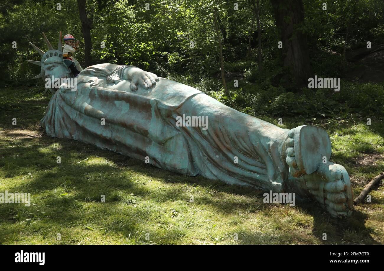 New York, New York, USA. 6th May, 2021. A view of 'Reclining Liberty' a 25 foot long sculpture ...