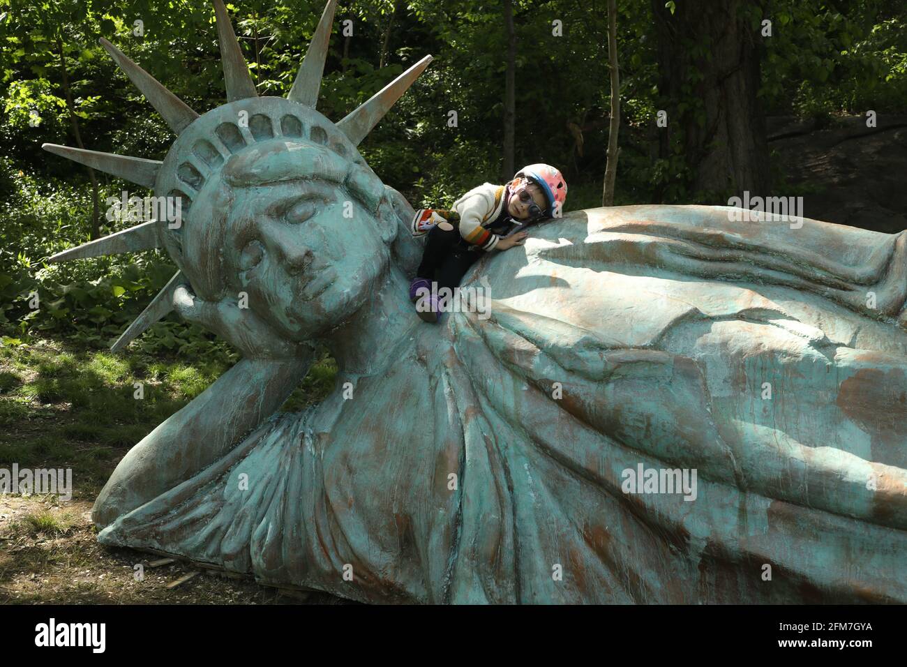 New York, New York, USA. 6th May, 2021. A view of 'Reclining Liberty' a 25 foot long sculpture ...