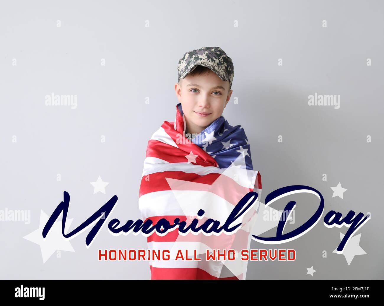 Cute little soldier with USA flag on light background. Memorial Day ...