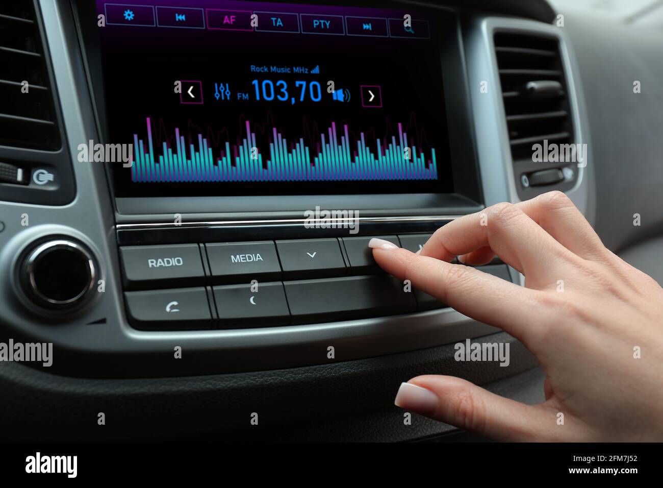 Woman tuning a radio hi-res stock photography and images - Alamy