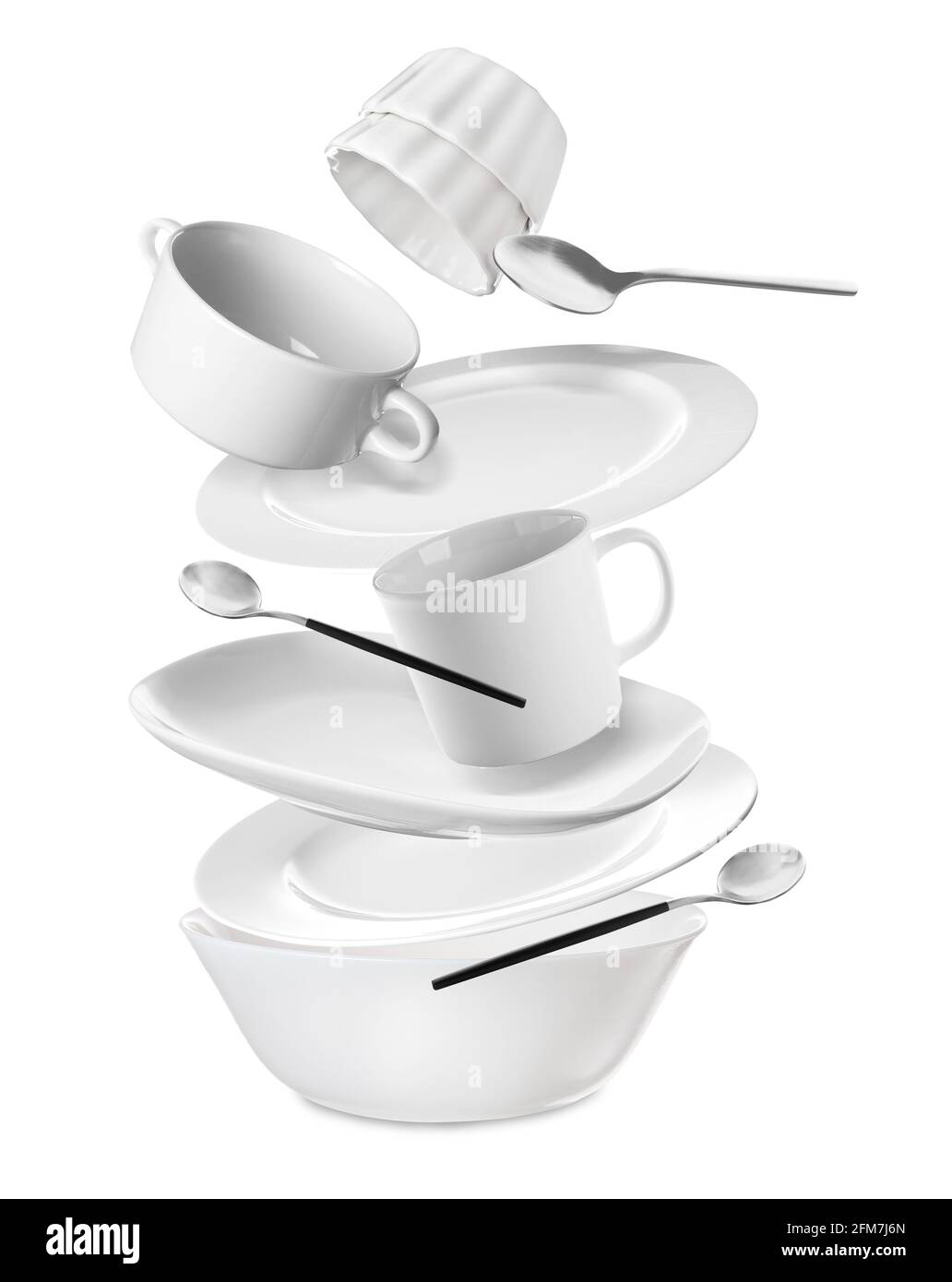 Flying clean tableware on white background Stock Photo - Alamy