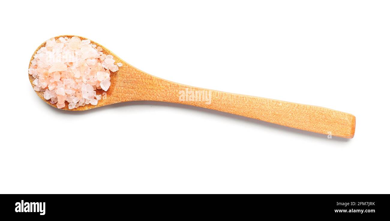 Spoon with salt on white background Stock Photo - Alamy