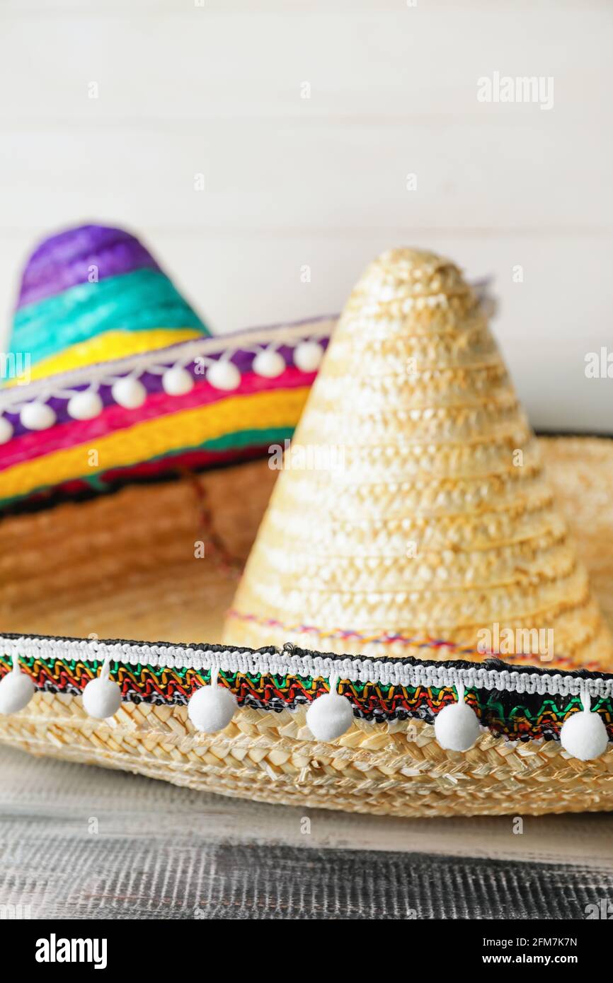 Mexican sombreros on wooden background, closeup Stock Photo - Alamy
